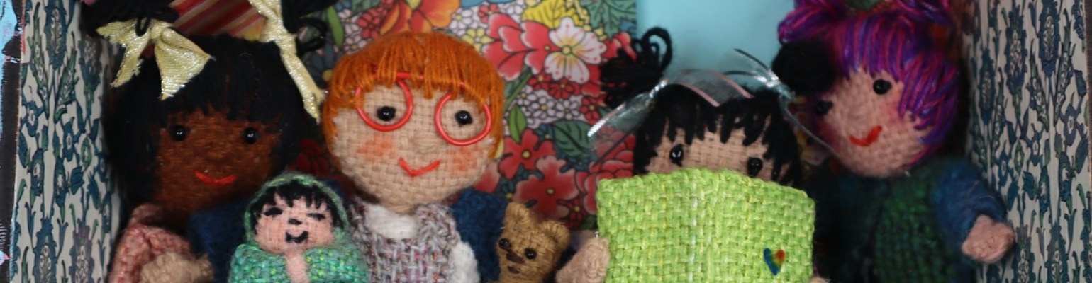 A tiny little book with a woven cover for the Lily Doll project ...
