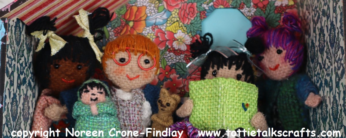 A tiny little book with a woven cover for the Lily Doll project ...
